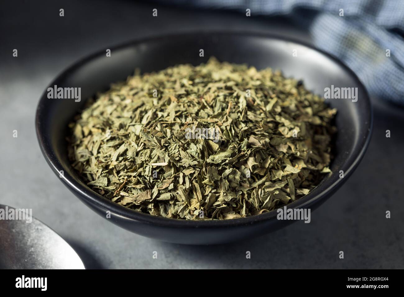 Healthy Organic Dried Basil Spice in a Bowl Stock Photo - Alamy