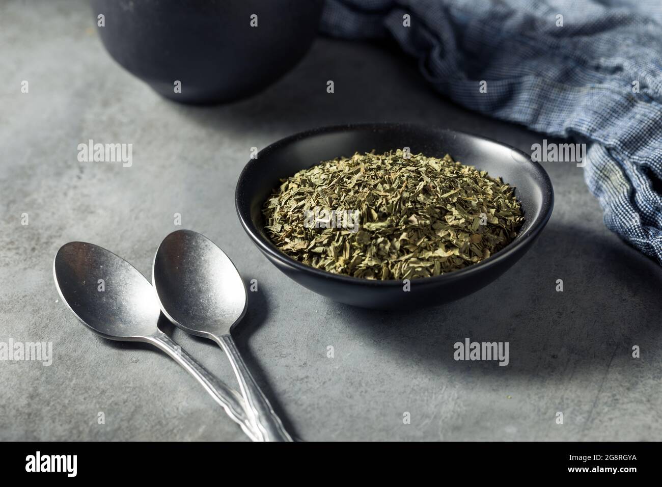 Healthy Organic Dried Basil Spice in a Bowl Stock Photo - Alamy