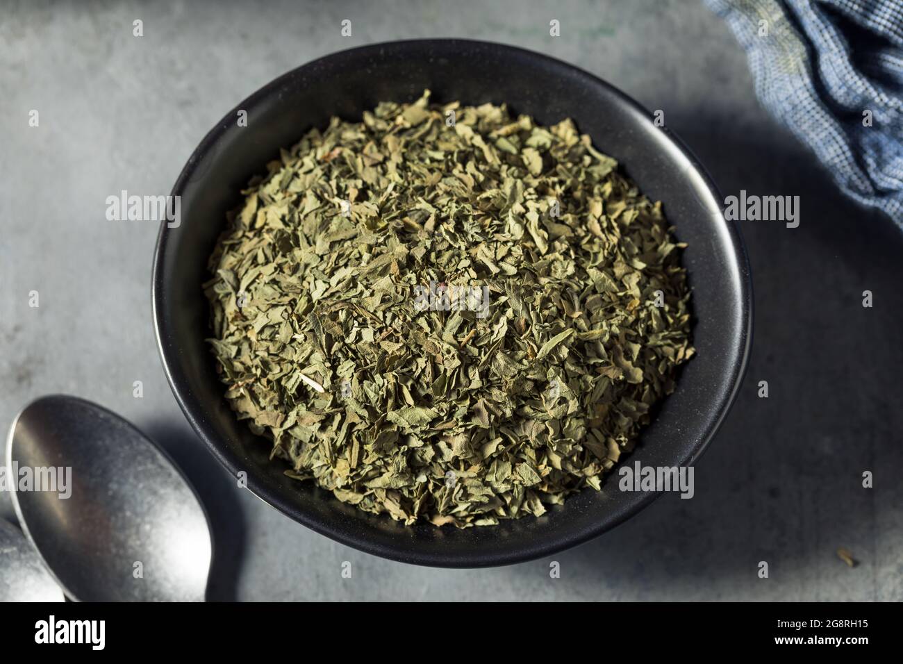 Healthy Organic Dried Basil Spice in a Bowl Stock Photo - Alamy
