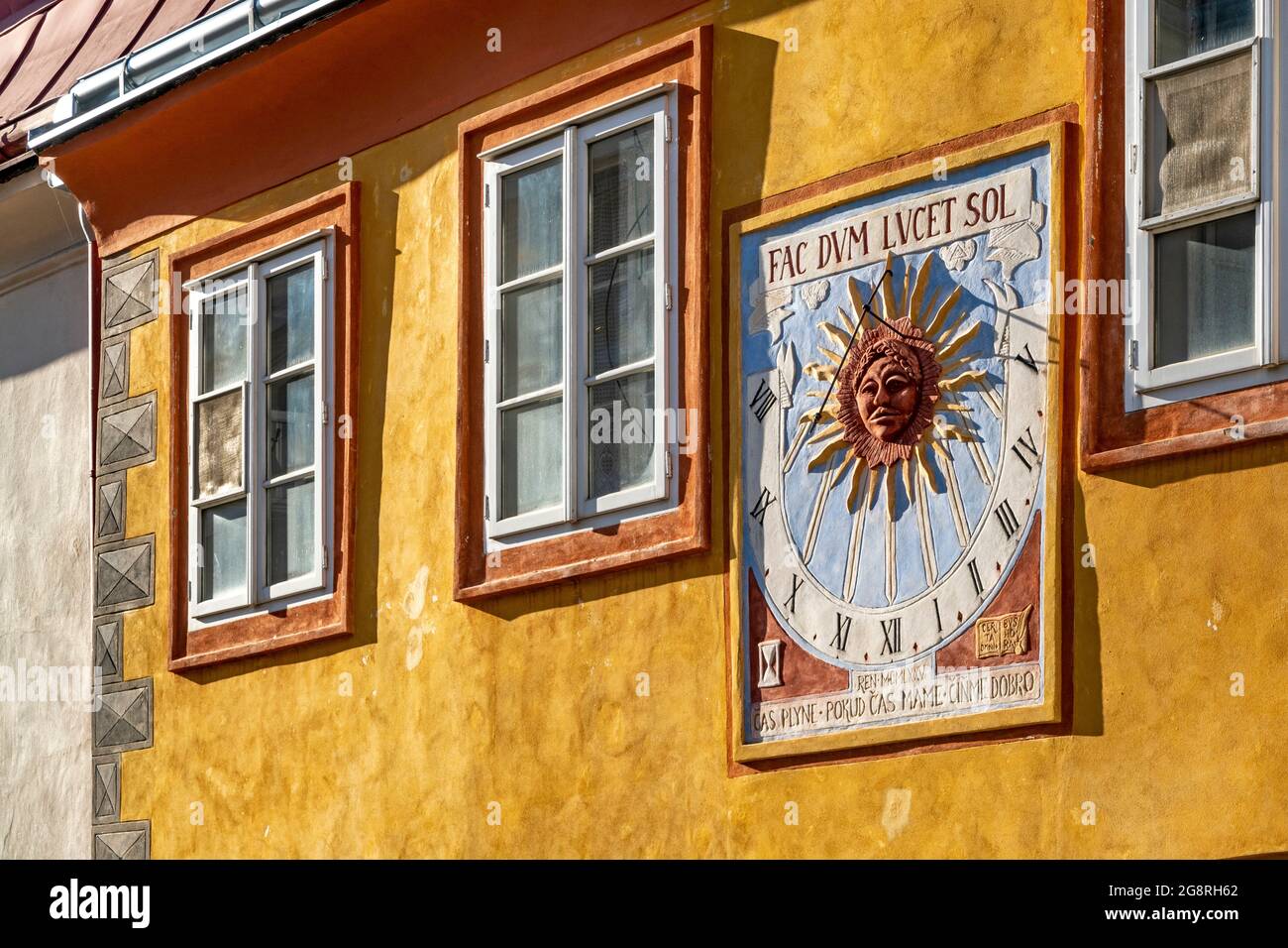 Vintage sundial on the facade of an old house, Kolin, Czech republic ...