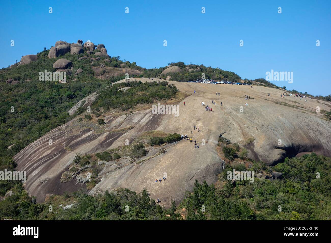 Tourists on huge rock formation of Pedra Grande in Atibaia, Sao Paulo ...