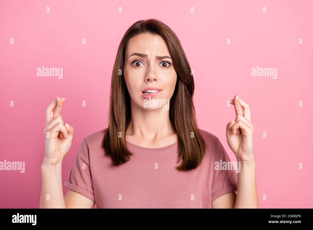 Photo of sweet nervous young woman dressed casual clothes fingers ...