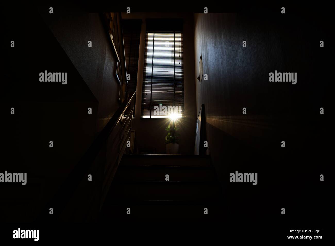 Light beam falling through the blinds into a dark house Stock Photo - Alamy