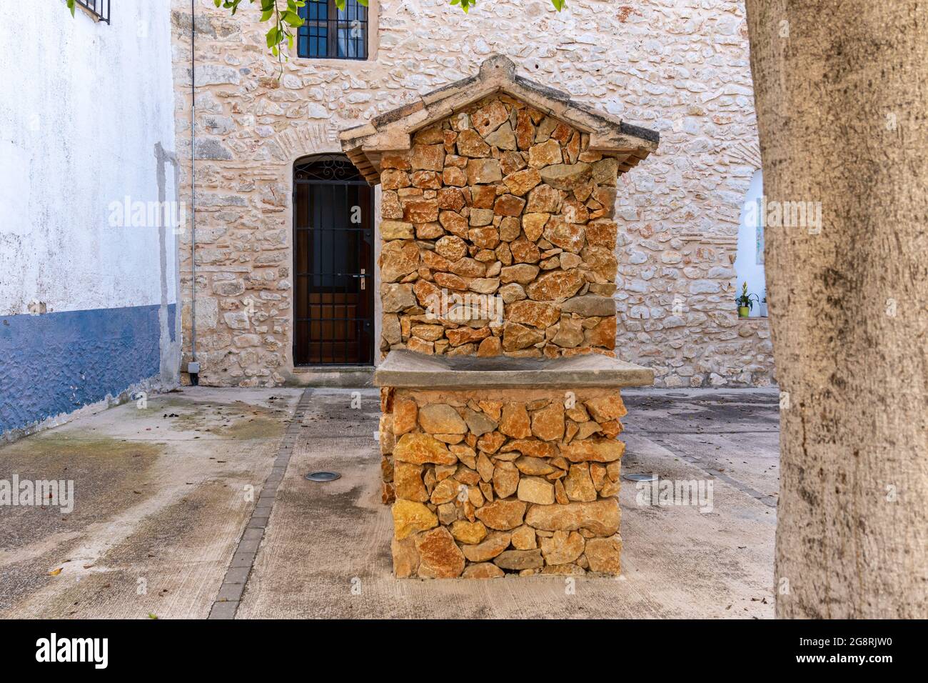 Exterior of an old stone wall building Stock Photo - Alamy