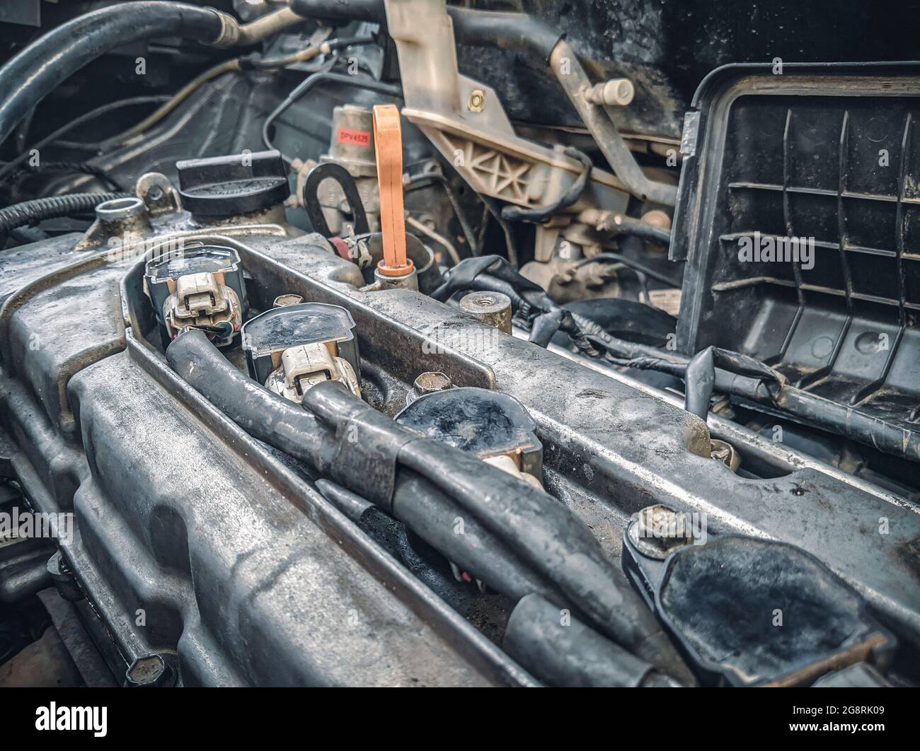Closeup of the engine and other parts of a modern car under the hood ...