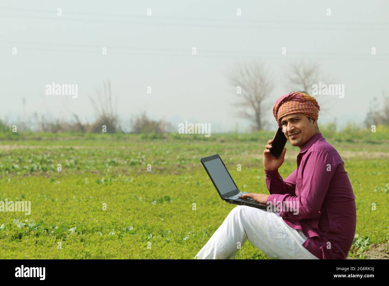 indian farmer talking phone call Stock Photo - Alamy