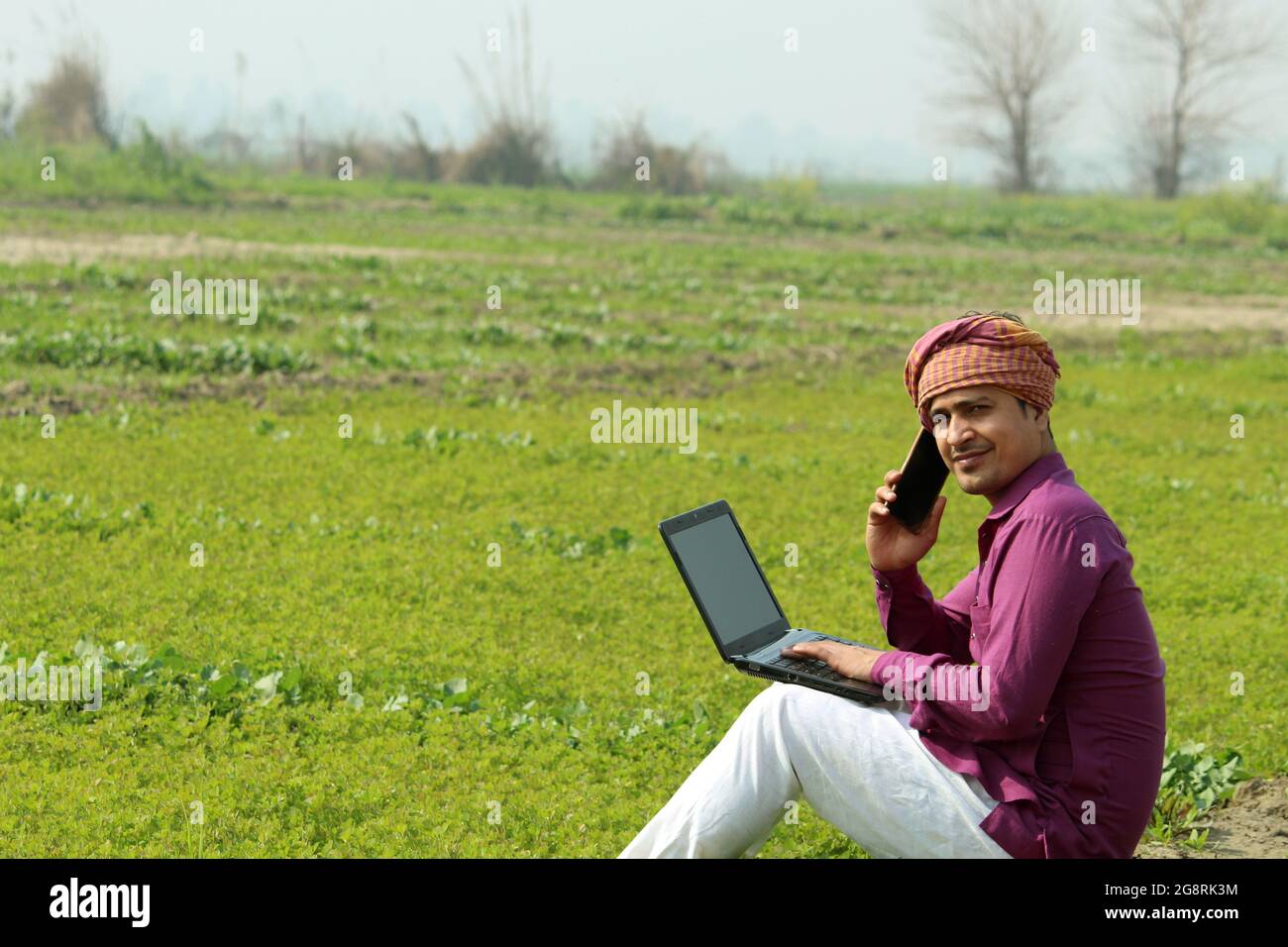 indian farmer talking phone call Stock Photo - Alamy