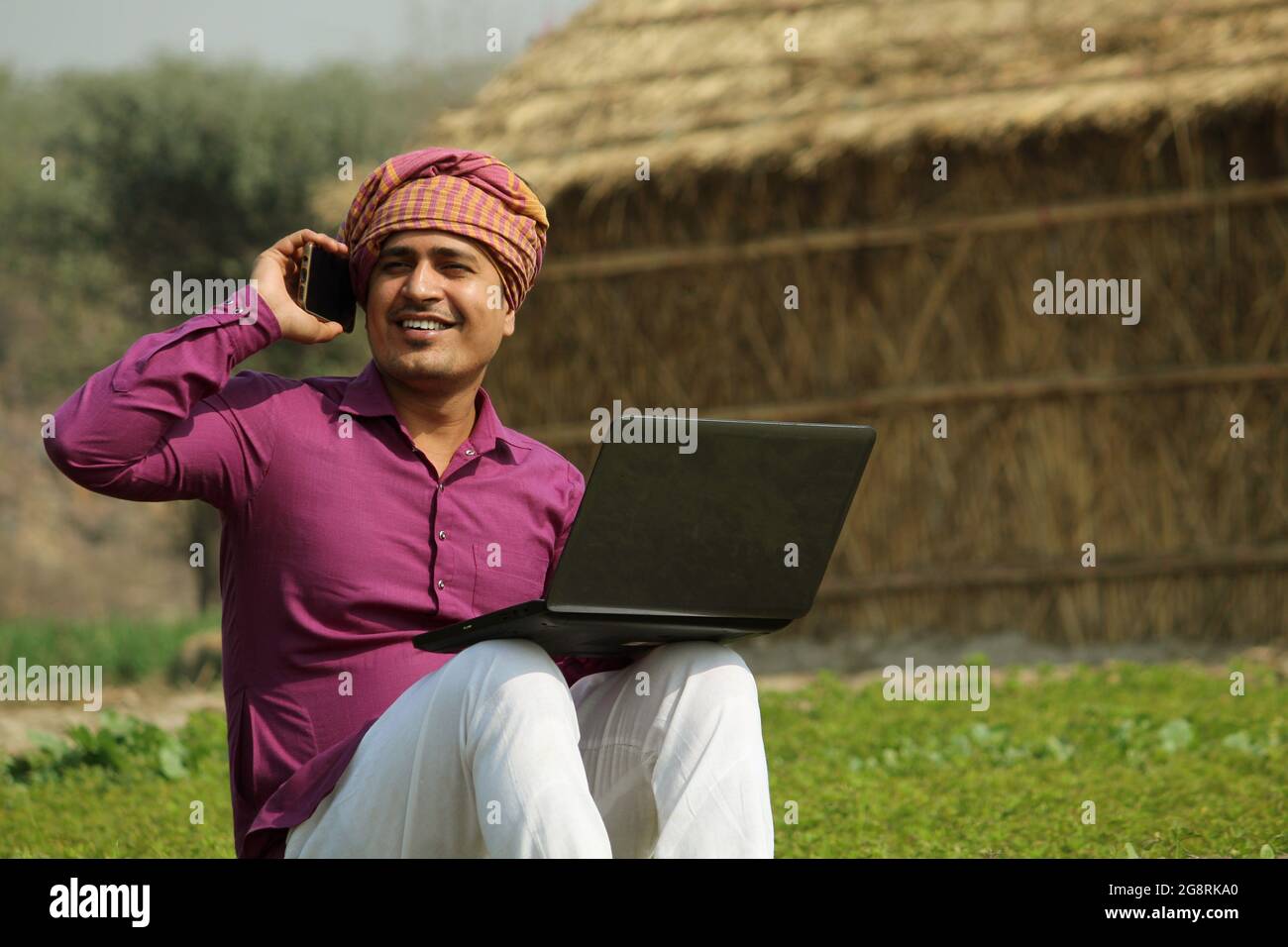 indian farmer talking phone call Stock Photo - Alamy