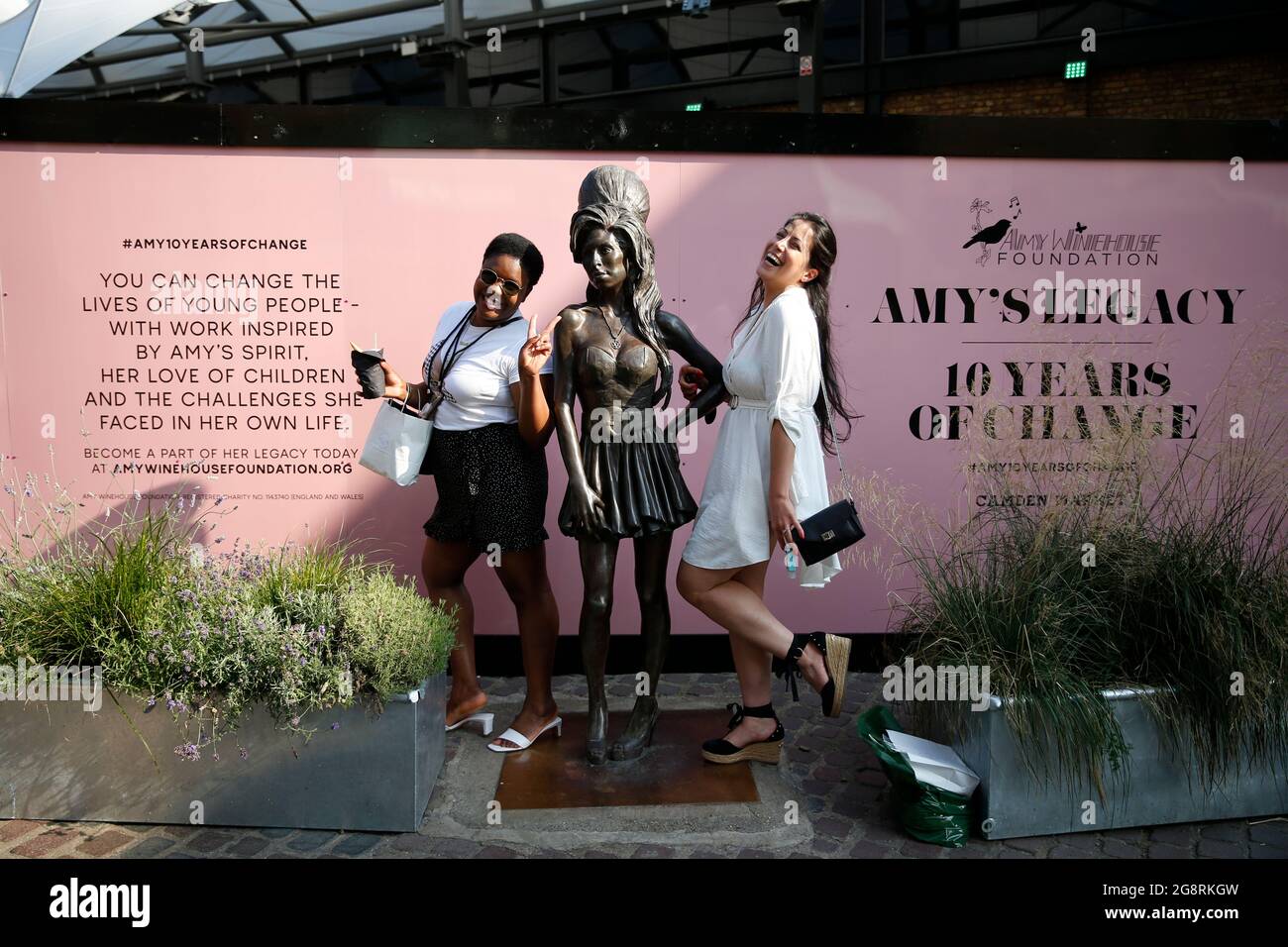 Dinilsa Neves (left), 28, Sara Moha, 32, pose for a photo with the ...