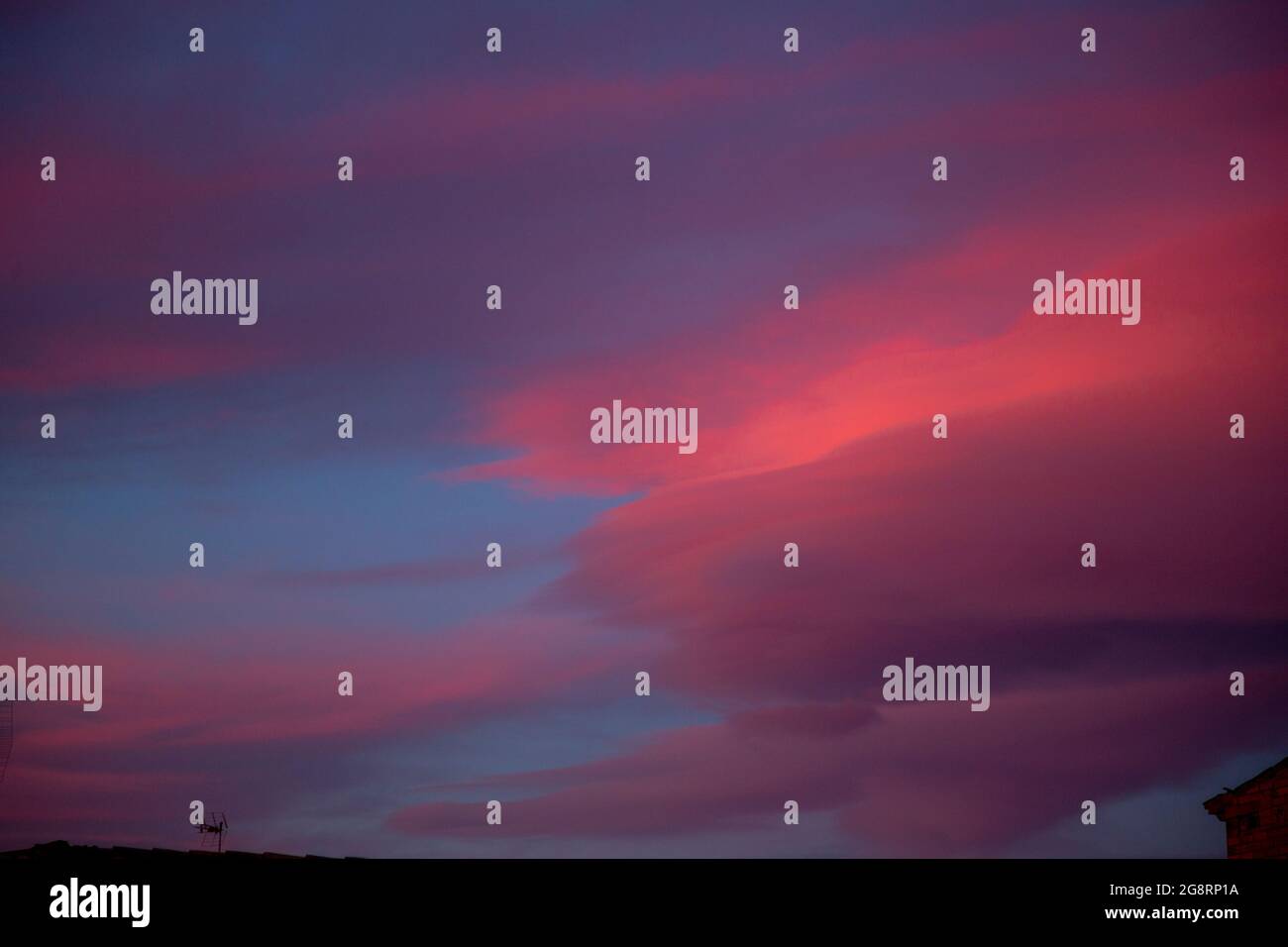 sunset skies with warm colors in summer times Stock Photo - Alamy