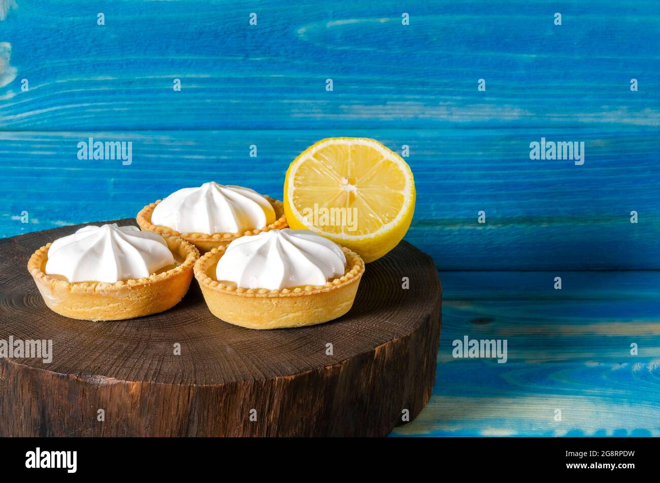 Homemade shortbread mini tart cakes with lemon curd and whipped cream ...