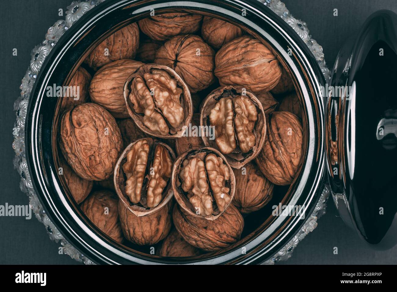 Top view of walnuts in a jar Stock Photo - Alamy