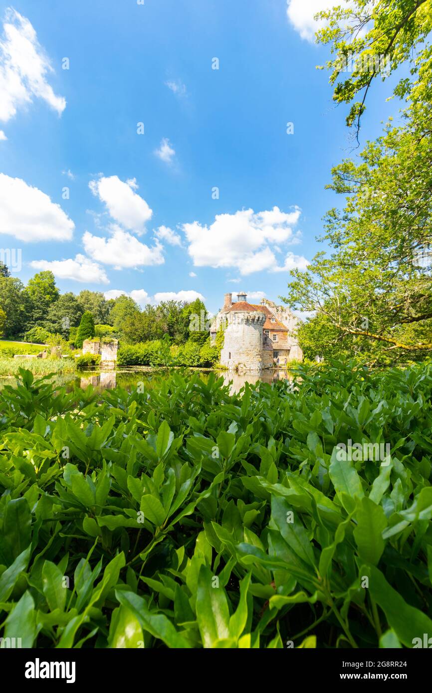 The 14th Century moated castle of Scotney castle in Kent Stock Photo ...