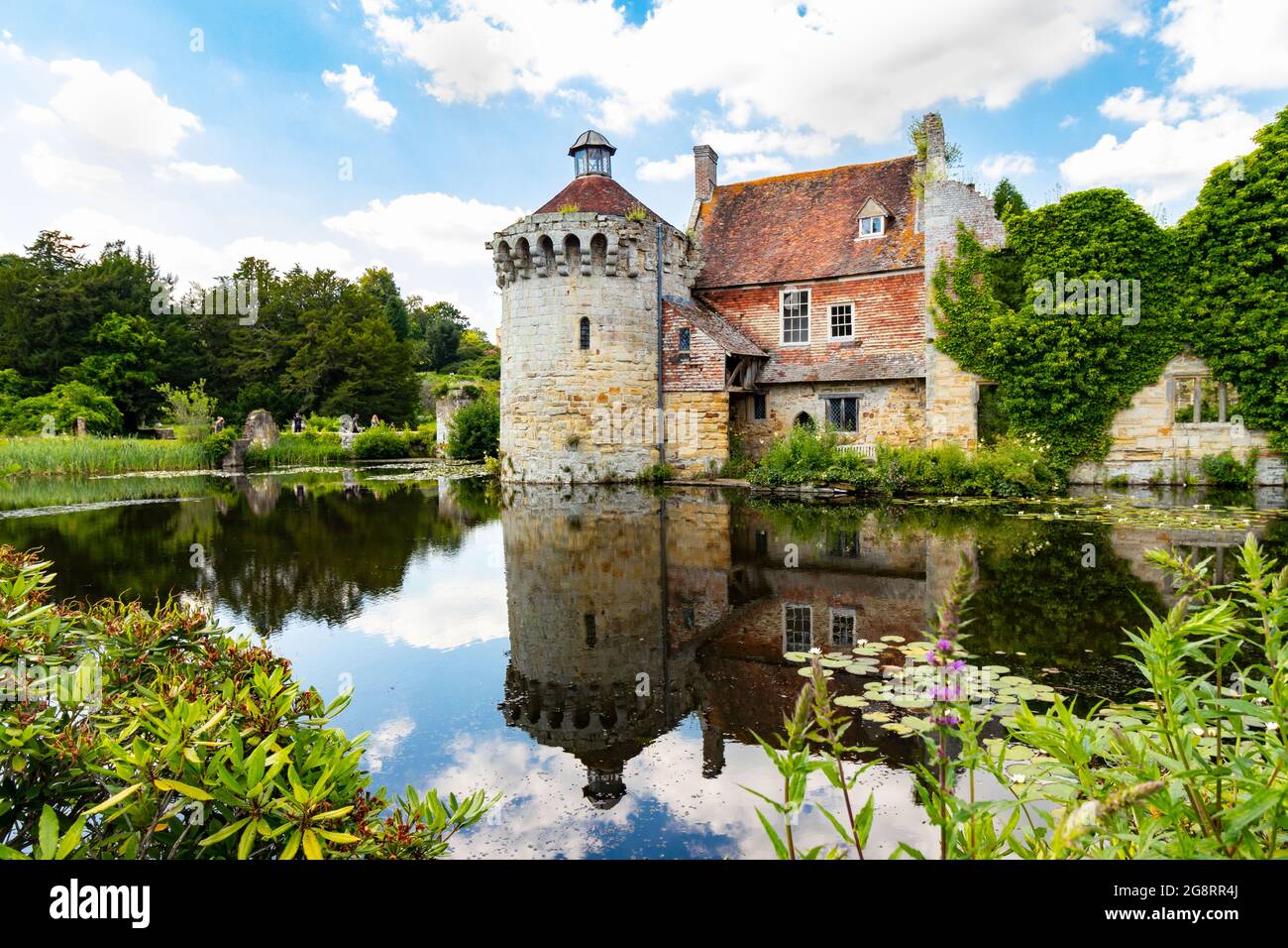 The 14th Century moated castle of Scotney castle in Kent Stock Photo ...