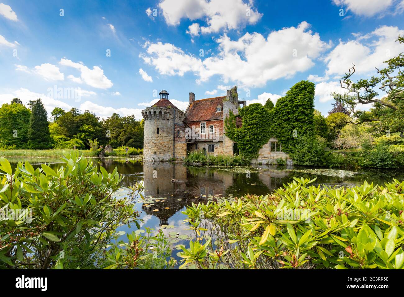 The 14th Century moated castle of Scotney castle in Kent Stock Photo ...