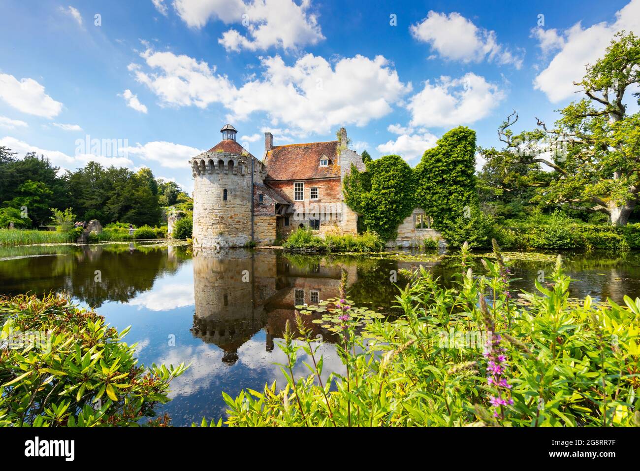 The 14th Century moated castle of Scotney castle in Kent Stock Photo ...