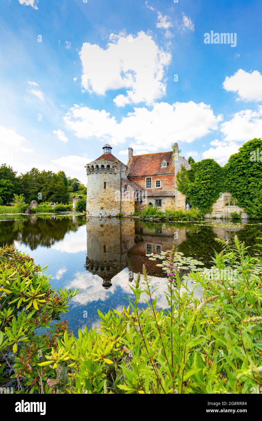 The 14th Century moated castle of Scotney castle in Kent Stock Photo ...