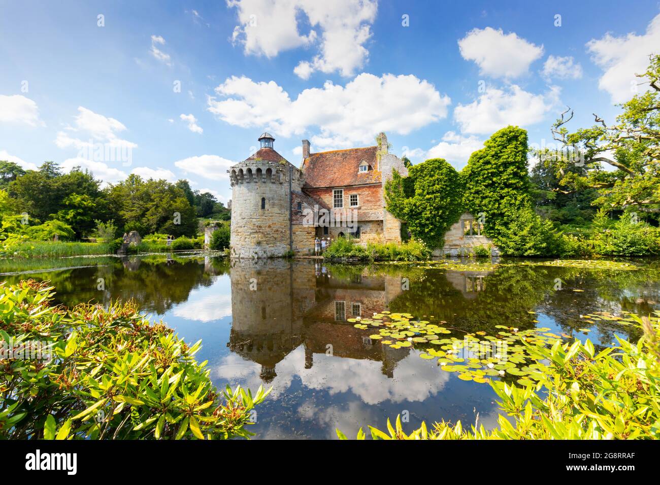 The 14th Century moated castle of Scotney castle in Kent Stock Photo ...