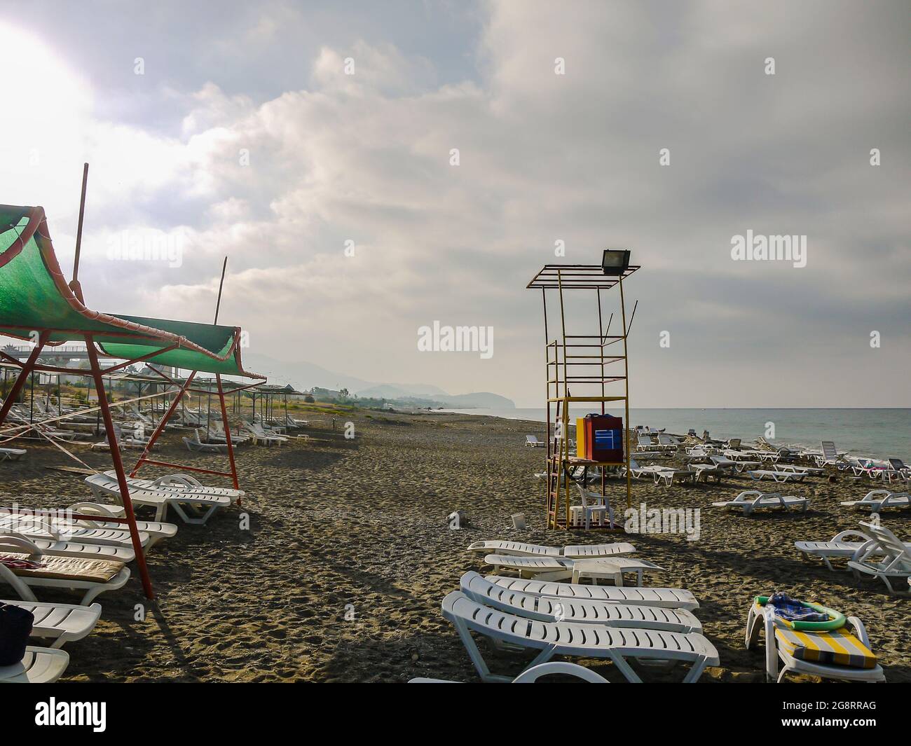 Empty beach resort due to lack of tourists. Empty sea beach beds. The ...