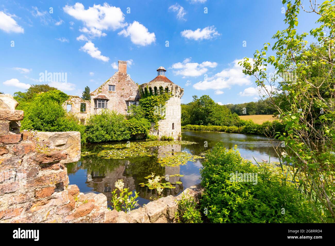 The 14th Century moated castle of Scotney castle in Kent Stock Photo ...