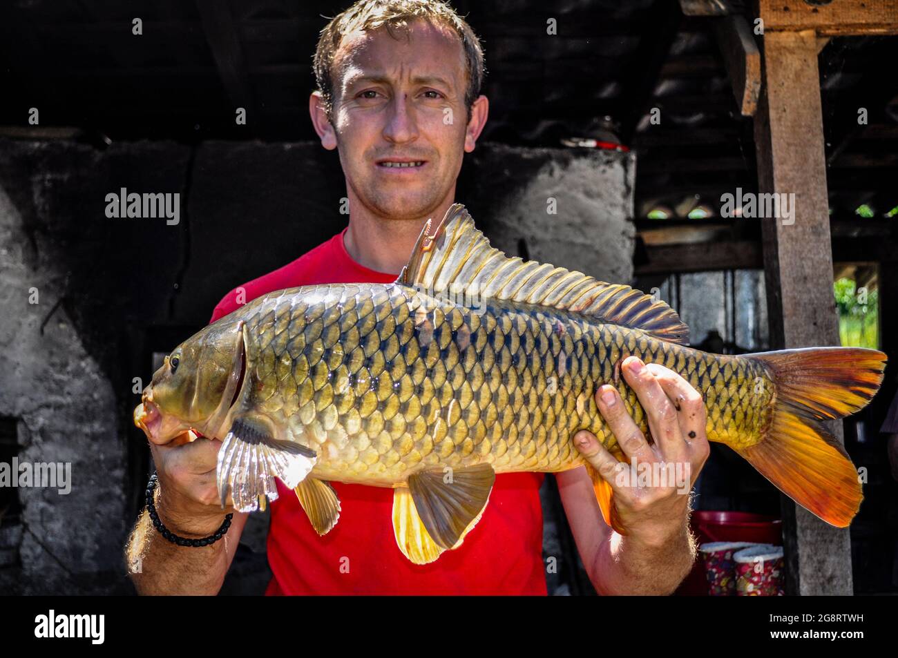 Holds fish hi-res stock photography and images - Alamy