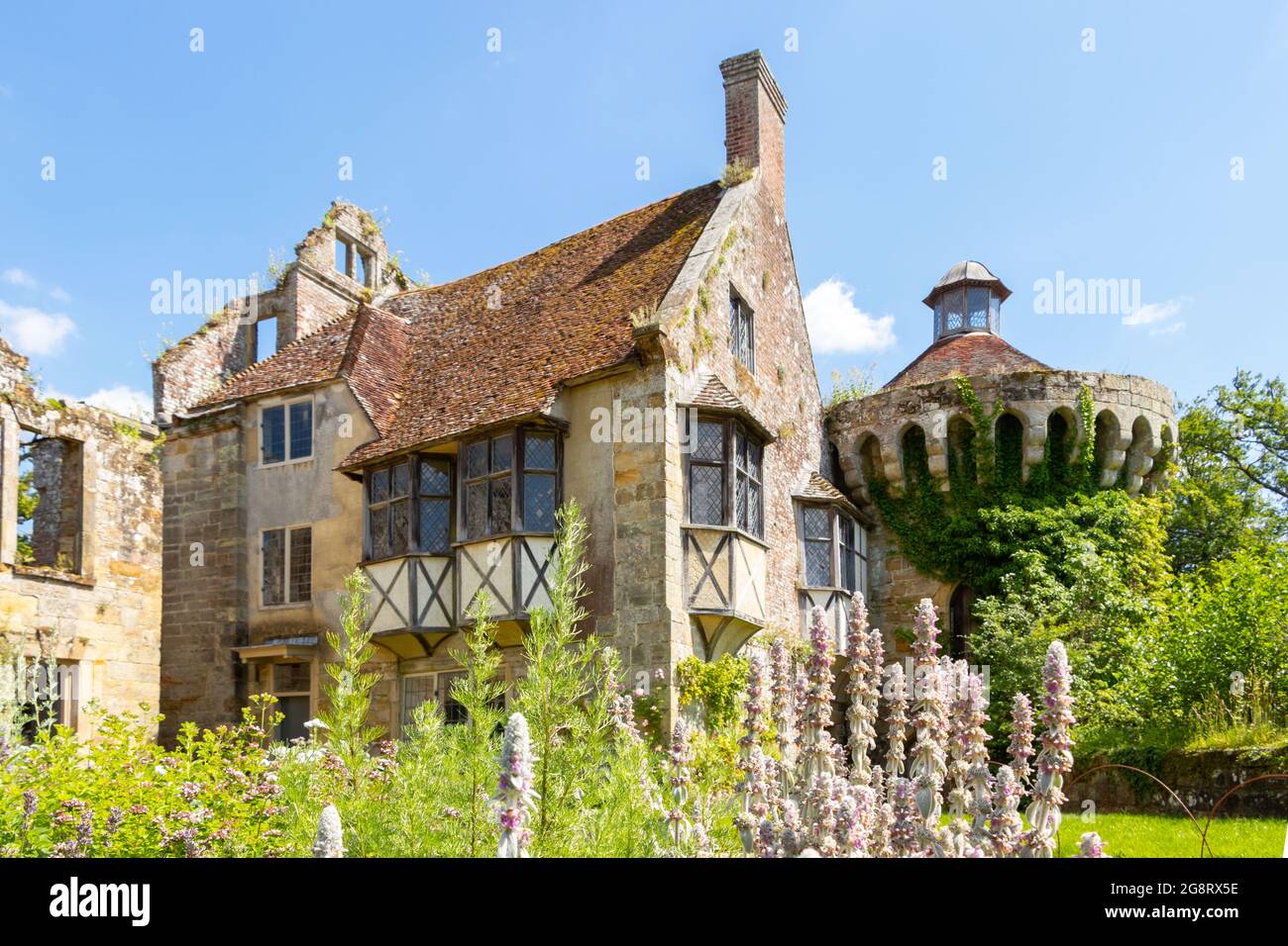 The 14th Century moated castle of Scotney castle in Kent Stock Photo ...