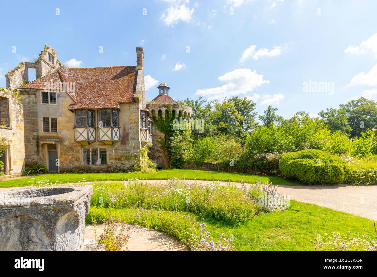 The 14th Century moated castle of Scotney castle in Kent Stock Photo ...