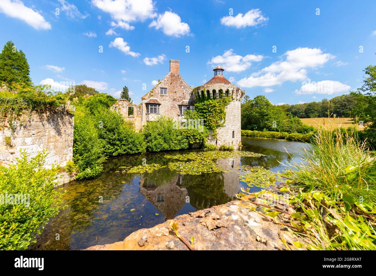 The 14th Century moated castle of Scotney castle in Kent Stock Photo ...