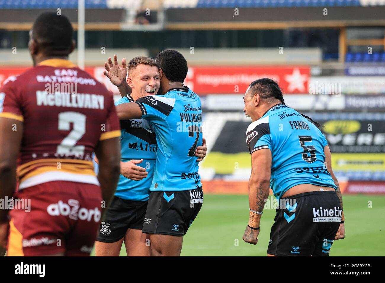 Jordan Lane (16) of Hull FC celebrates his try with Mitieli ...