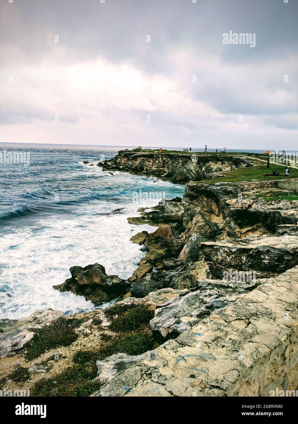 Eerie scenery of the ocean waves by the cliff in Punta Sur, Mexico ...
