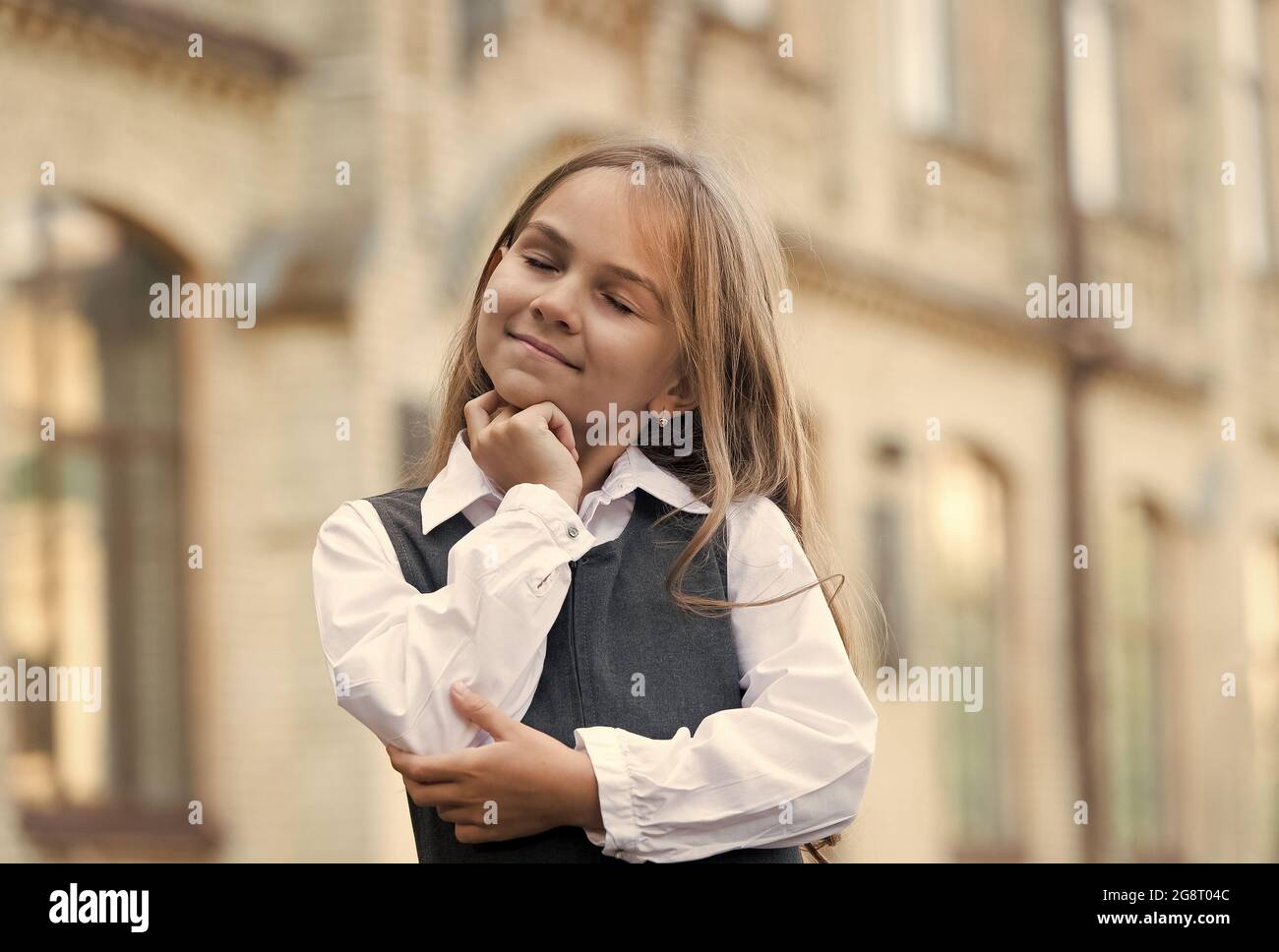 Let me think. Little kid lost in thoughts outdoors. Thoughtful look of ...