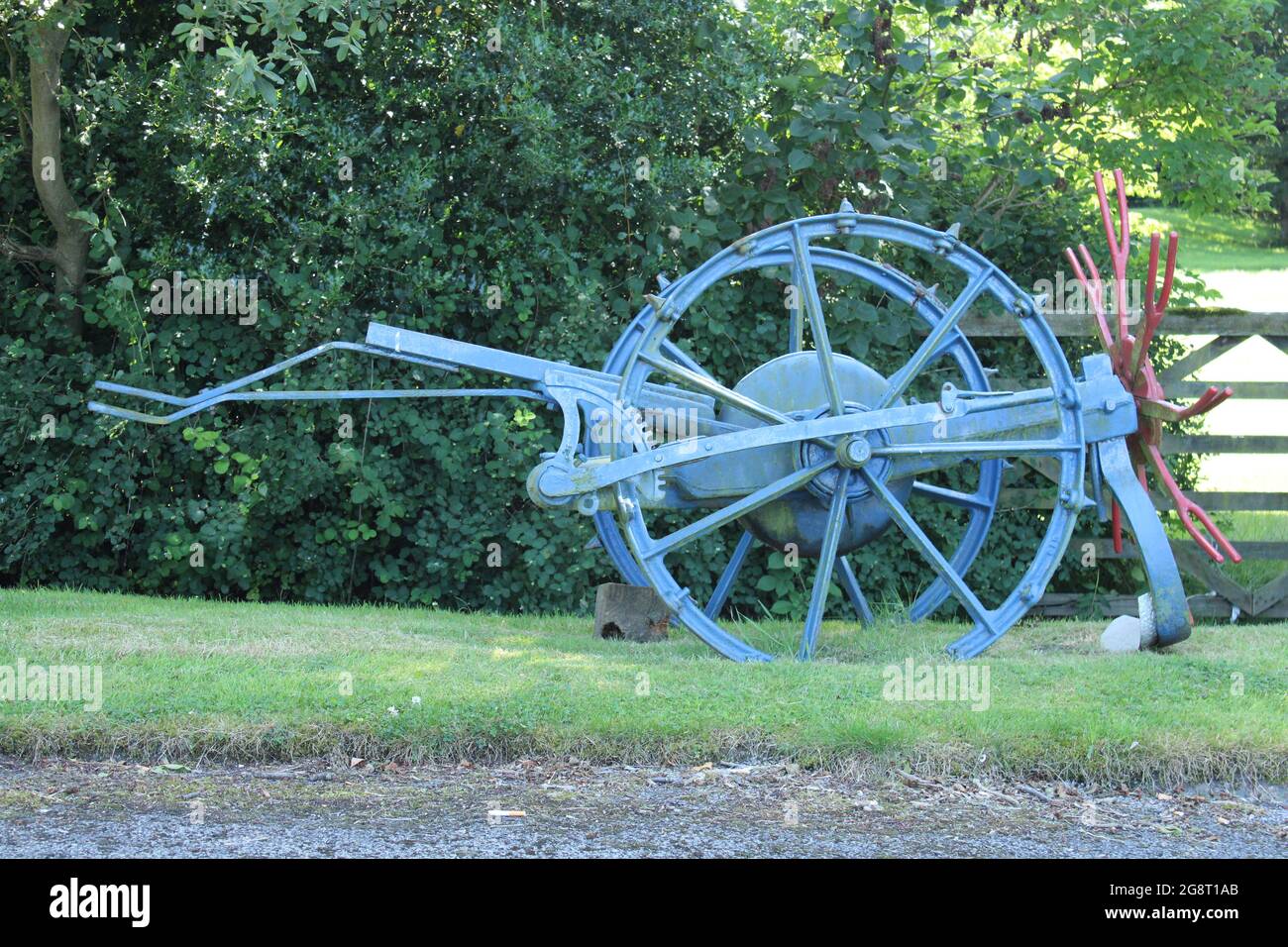 Vintage potato digger painted in pale blue, old farming equipment Stock ...