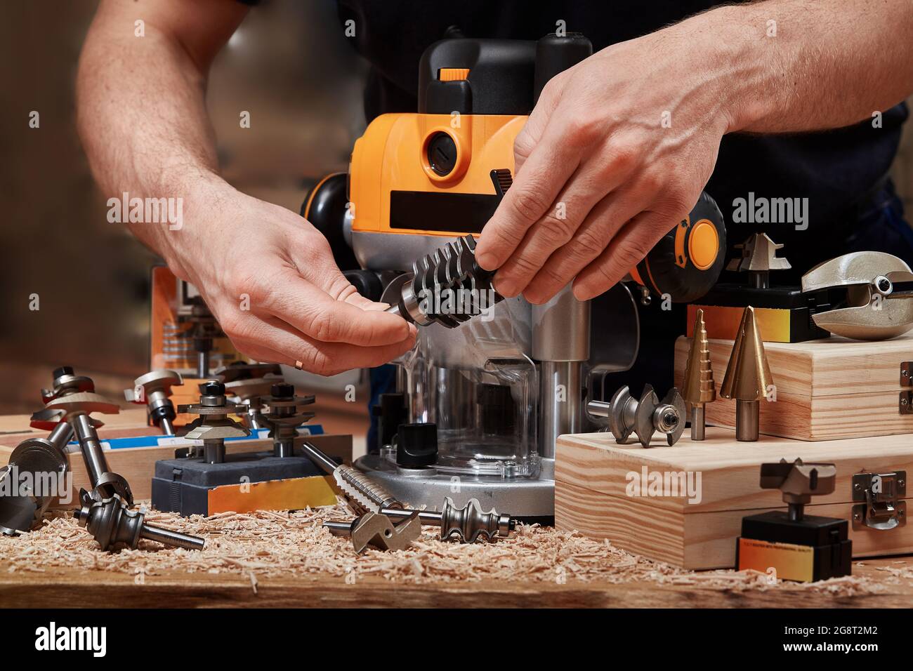 Milling wood in the joinery using manual mechanical cutters Stock Photo ...