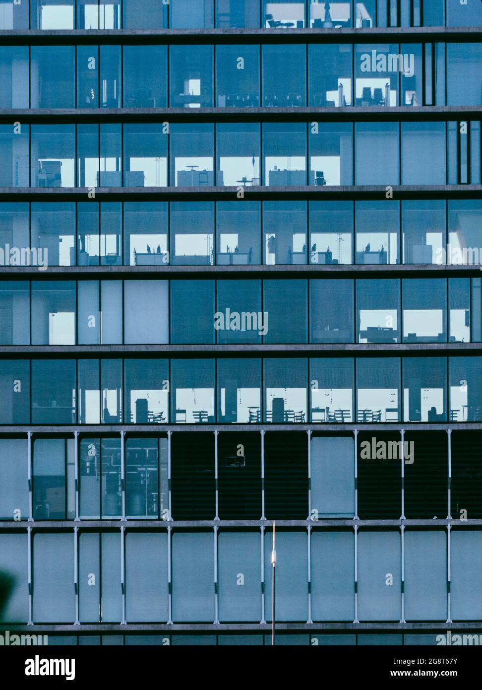 Beautiful view of the front facade of a modern building with glass ...