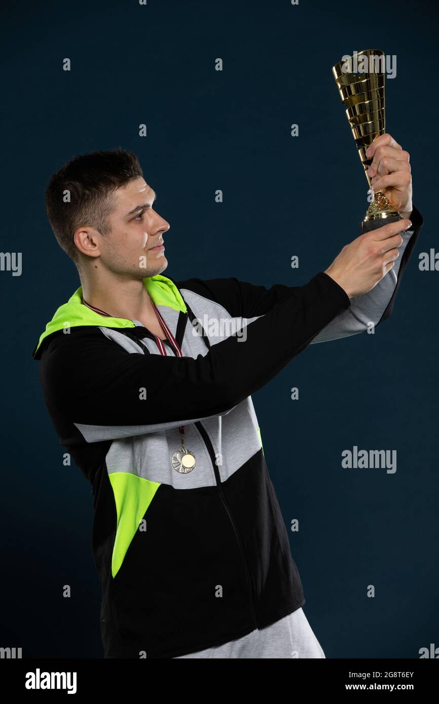 Strong athlete with trophy hi-res stock photography and images - Alamy