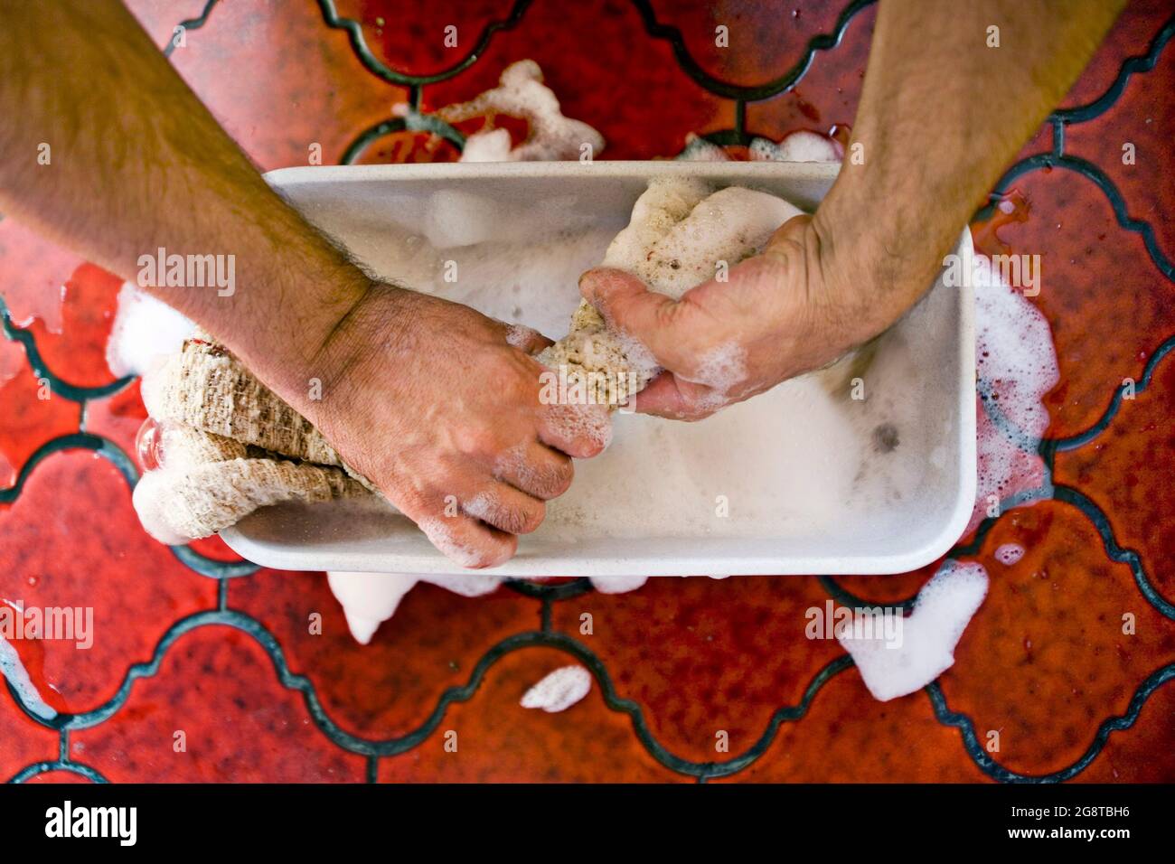 container with cleaning agent and rag Stock Photo - Alamy