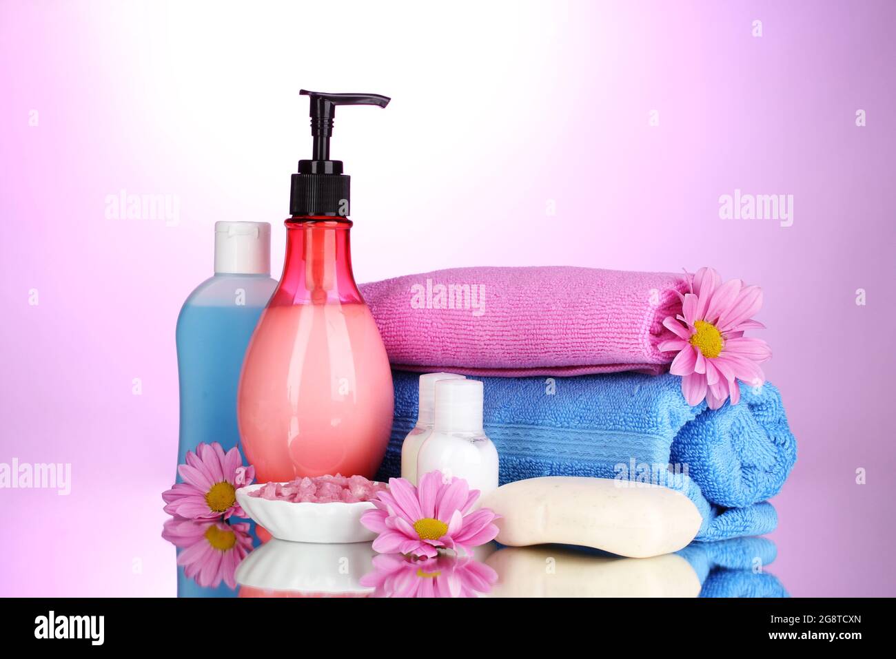 Hotel amenities kit on purple background Stock Photo - Alamy