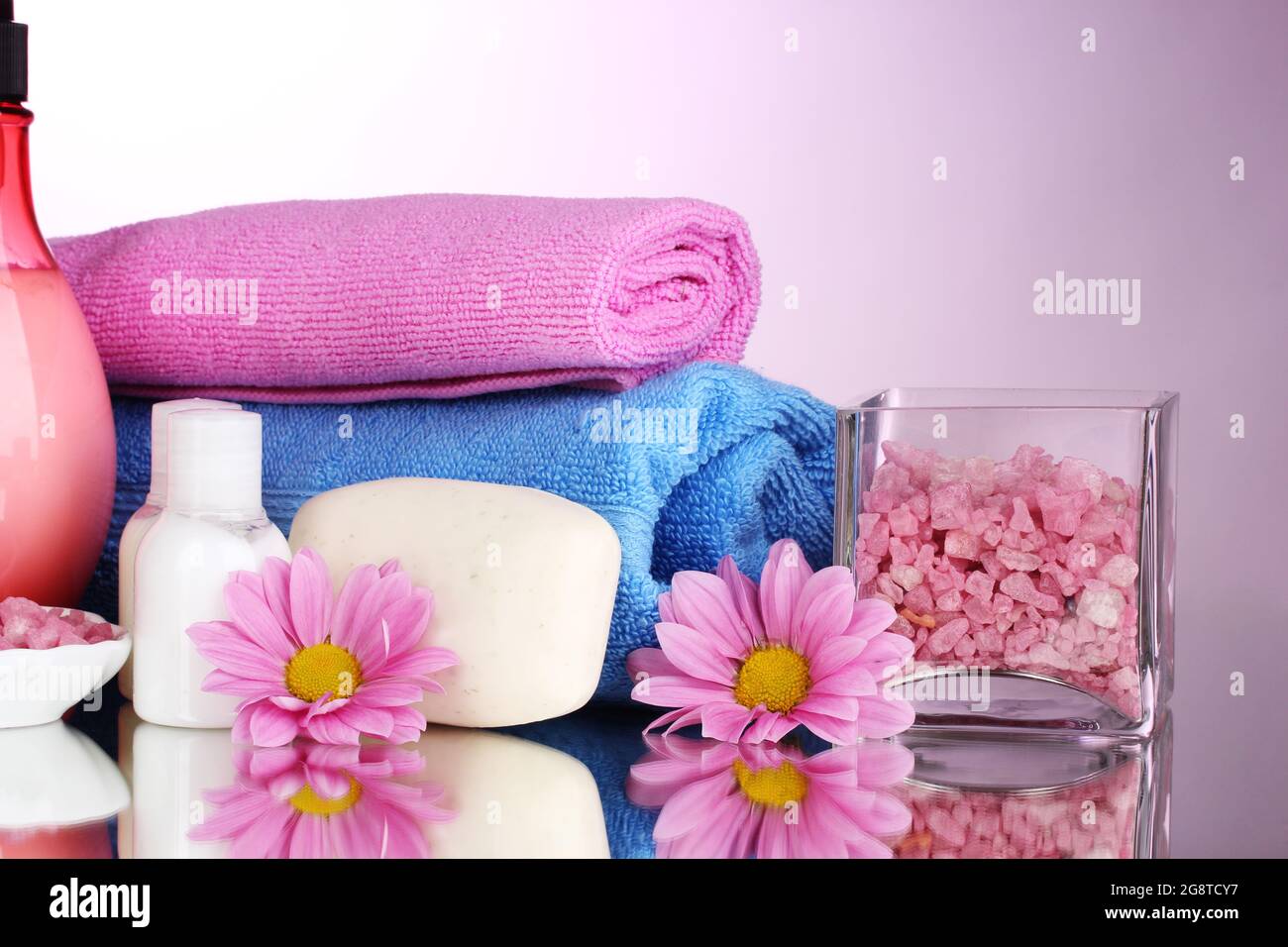 Hotel amenities kit on purple background Stock Photo - Alamy