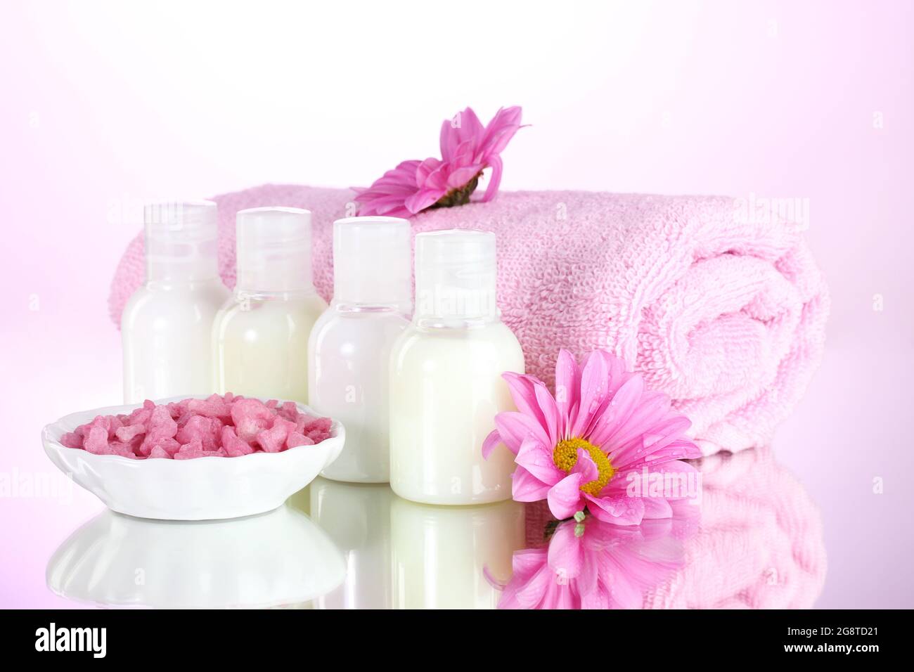 Hotel amenities kit on pink background Stock Photo - Alamy