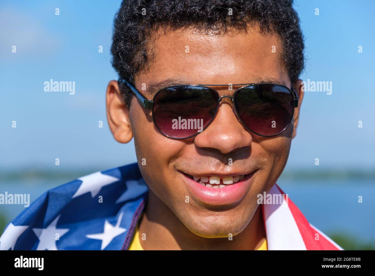 Flag on shoulders hi-res stock photography and images - Alamy