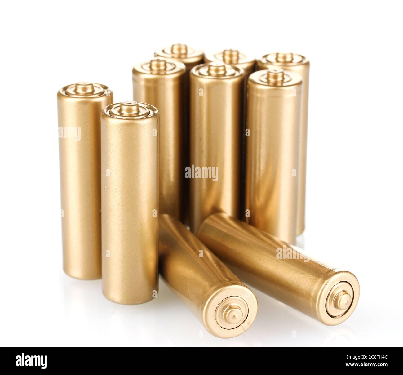 golden batteries isolated on white Stock Photo - Alamy