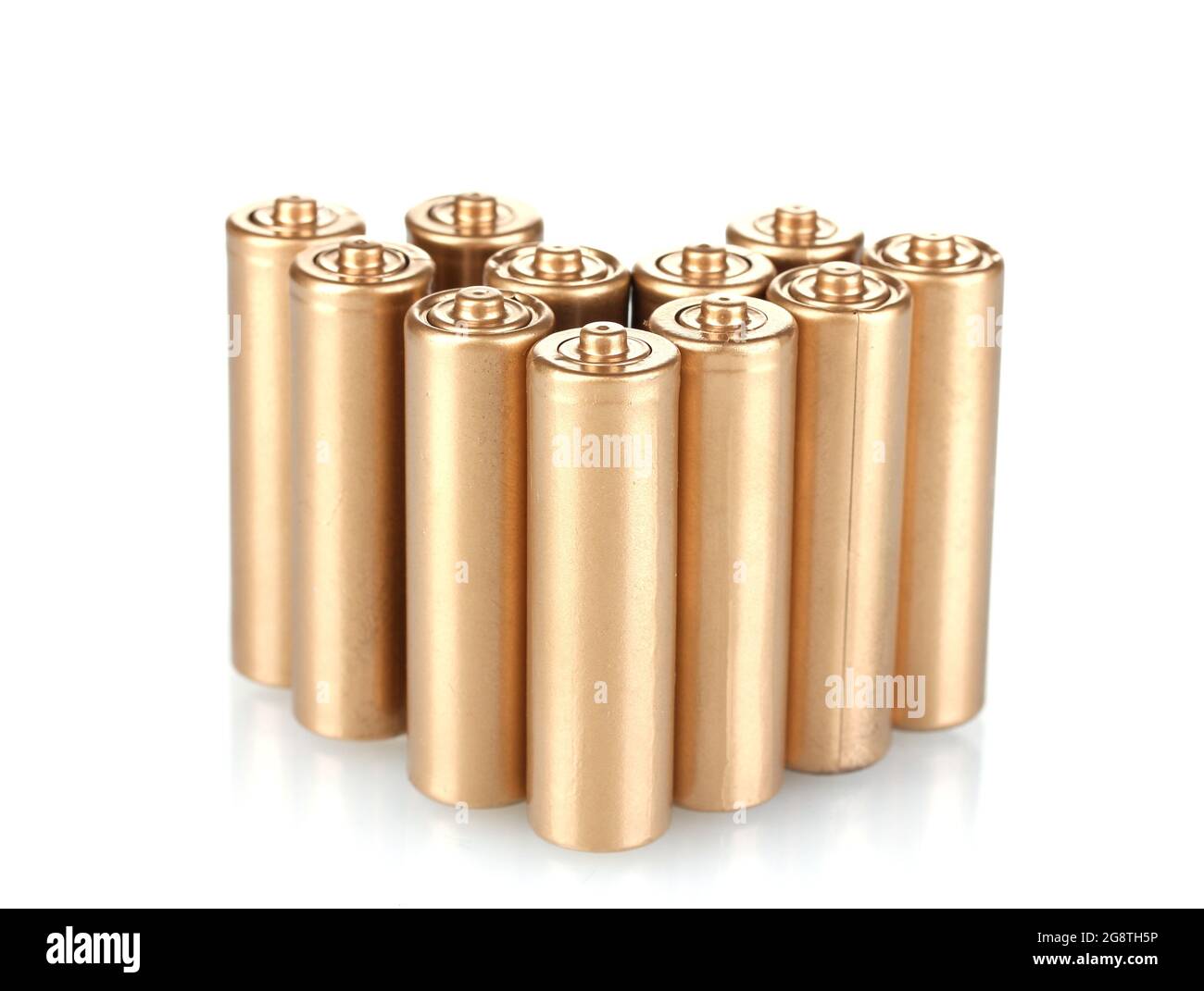 golden batteries isolated on white Stock Photo - Alamy