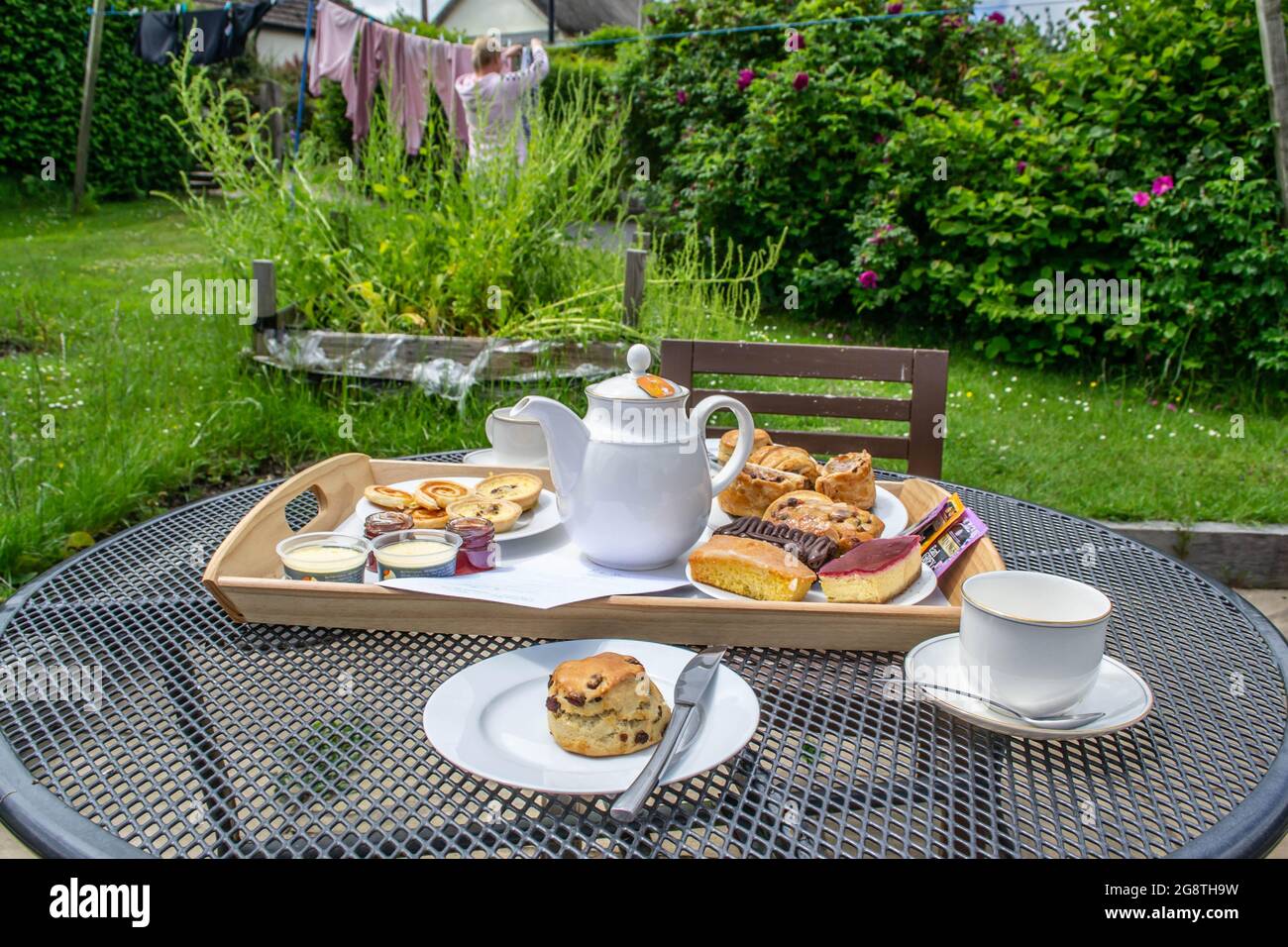 DEVON, ENGLAND- 25 June 2021: Afternoon tea selection in Devon, England ...