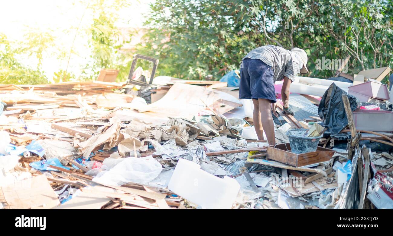 Workers are working in garbage carton box management with health risks ...