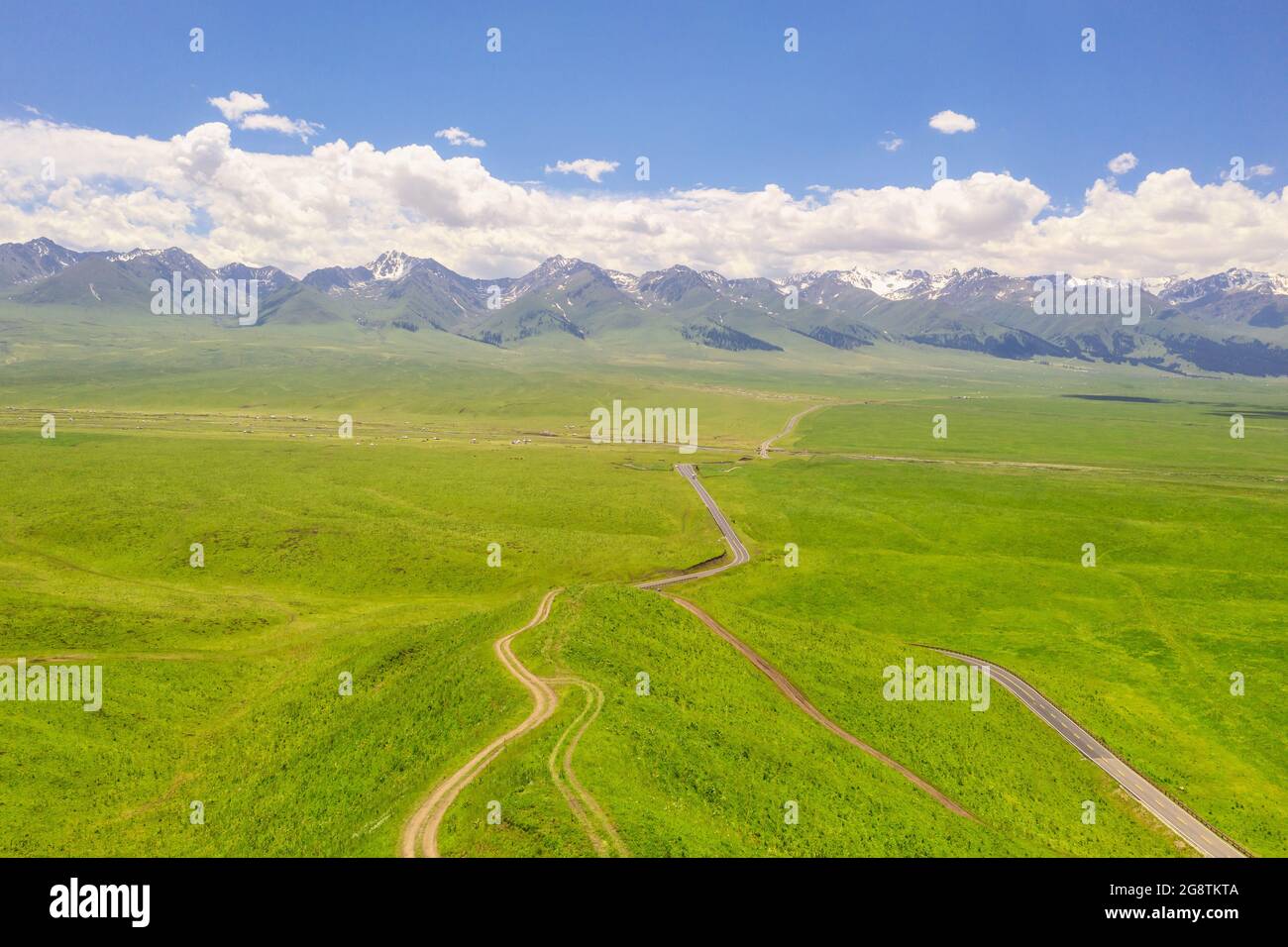 Nalati grassland with the blue sky. Shot in Xinjiang, China Stock Photo ...