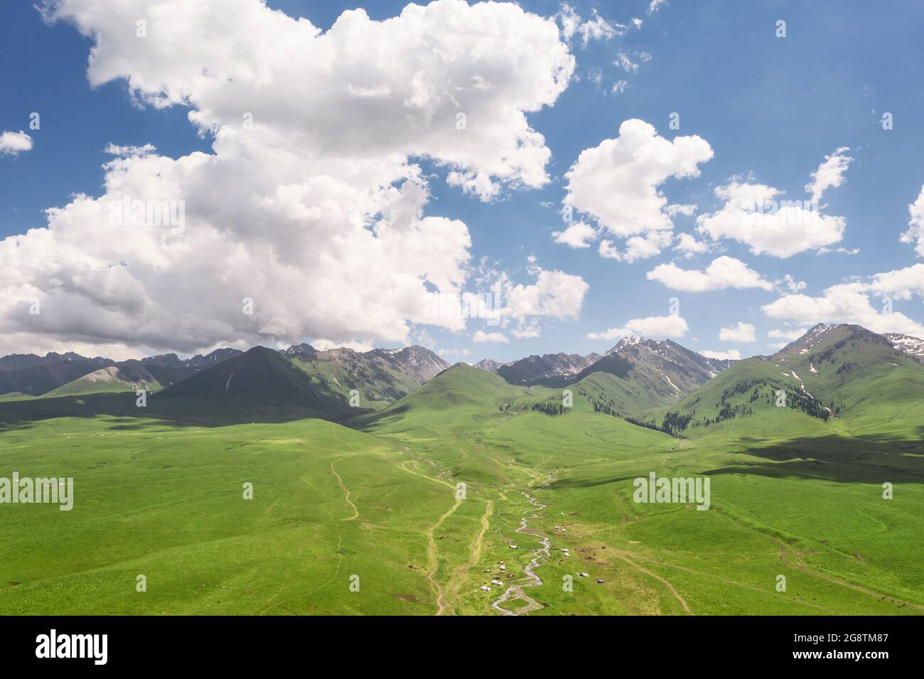 Nalati grassland with the blue sky. Shot in Xinjiang, China Stock Photo ...