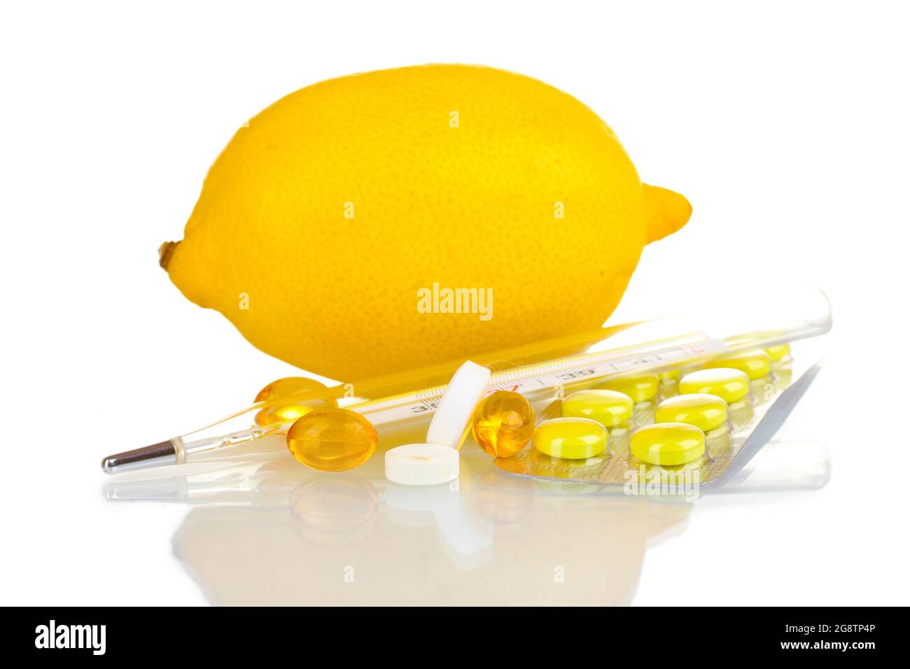 lemon, pills and thermometer isolated on white Stock Photo - Alamy