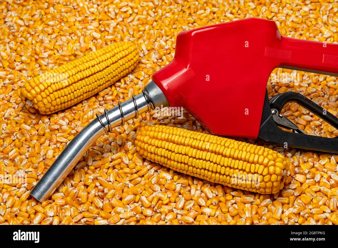 Ethanol gasoline fuel nozzle and corn kernels. Biofuel, agriculture and ...