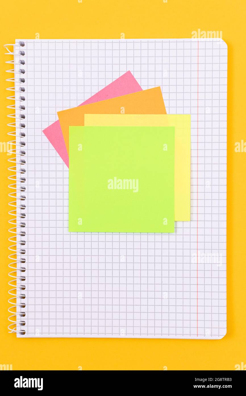 A Notepad with Sticky Notes Lying on Yellow Table - Blank Template. Top ...