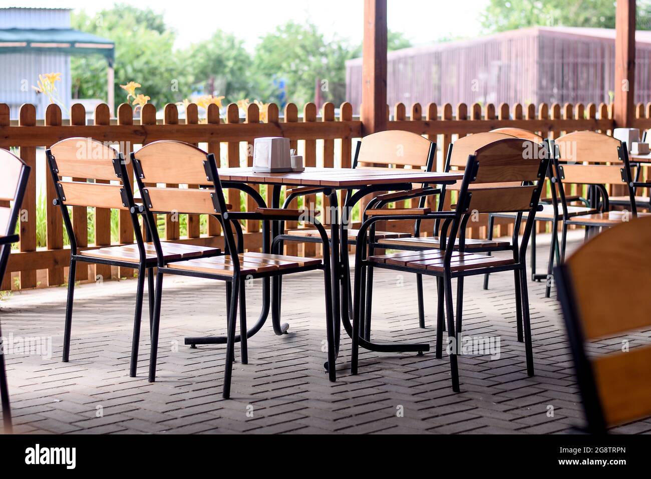 an empty cafe on the street without customers Stock Photo - Alamy